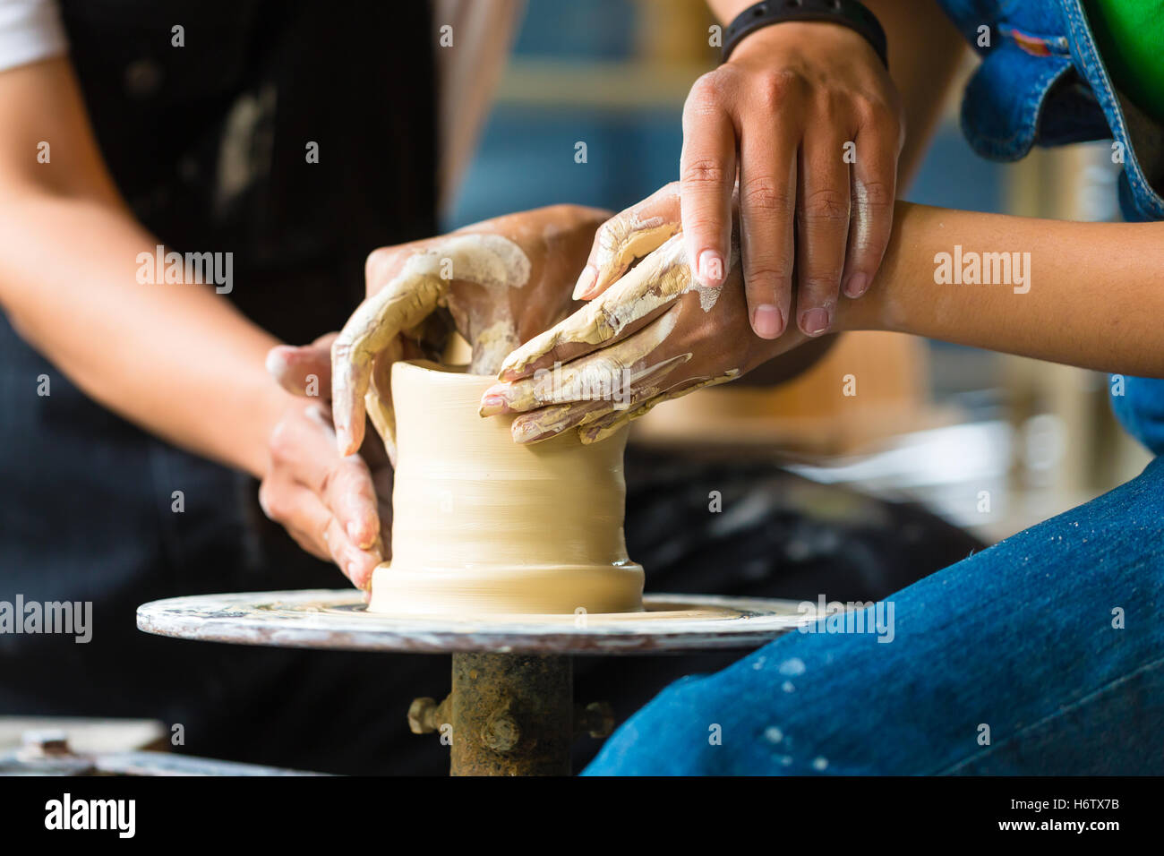 potter working on a potter's wheel Stock Photo - Alamy