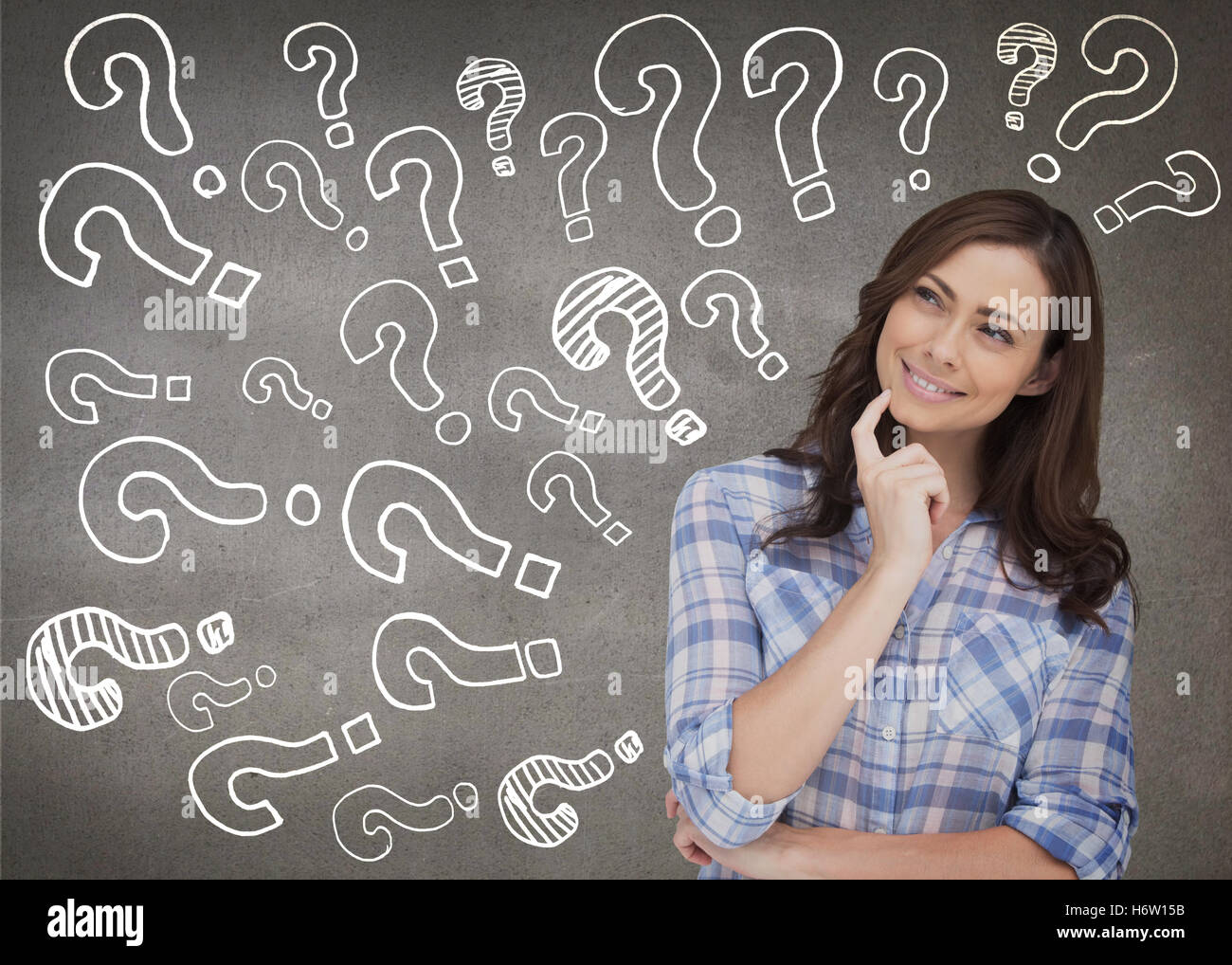 Attractive woman thinking on grey background Stock Photo - Alamy