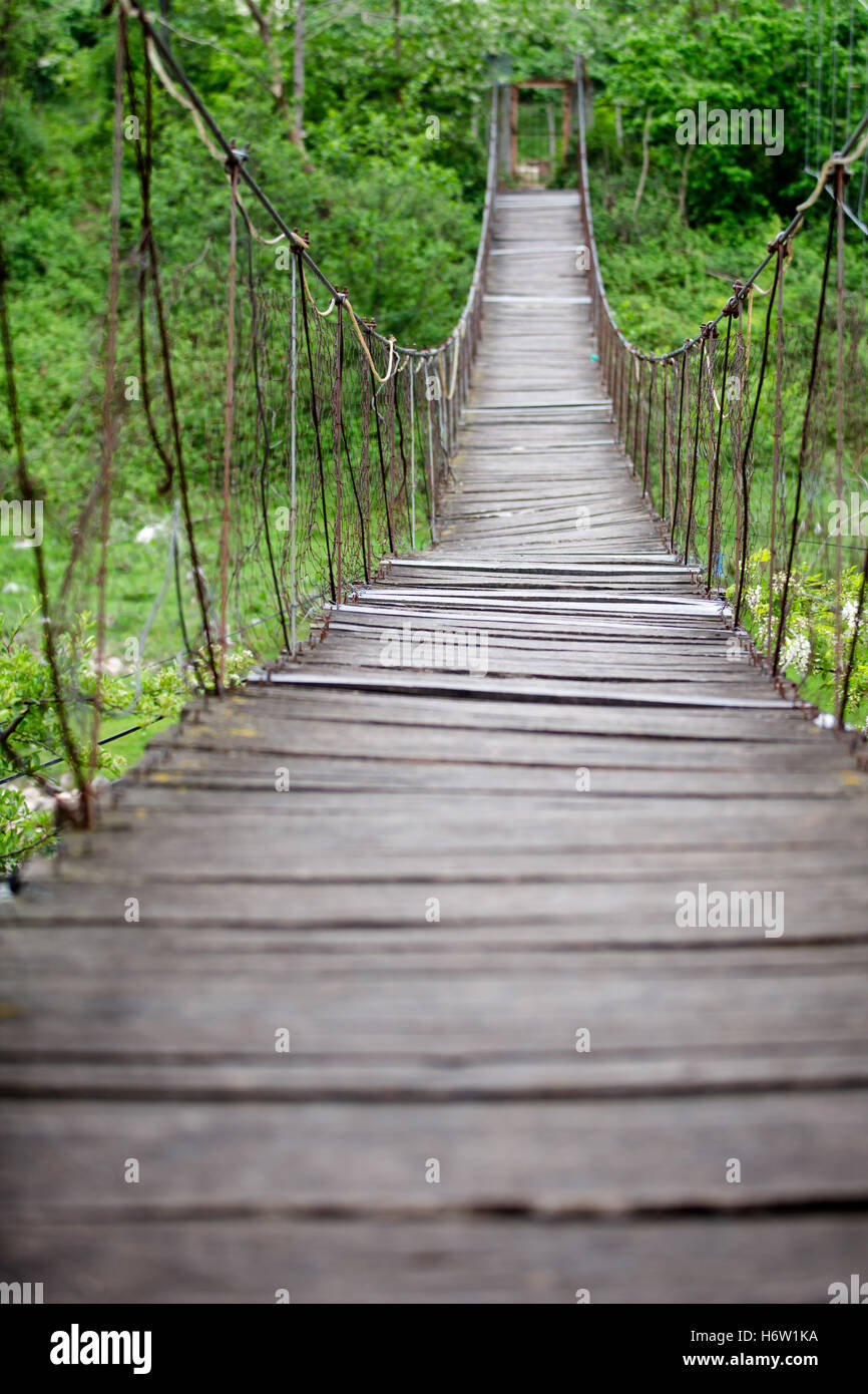 dilapidated suspension bridge Stock Photo - Alamy