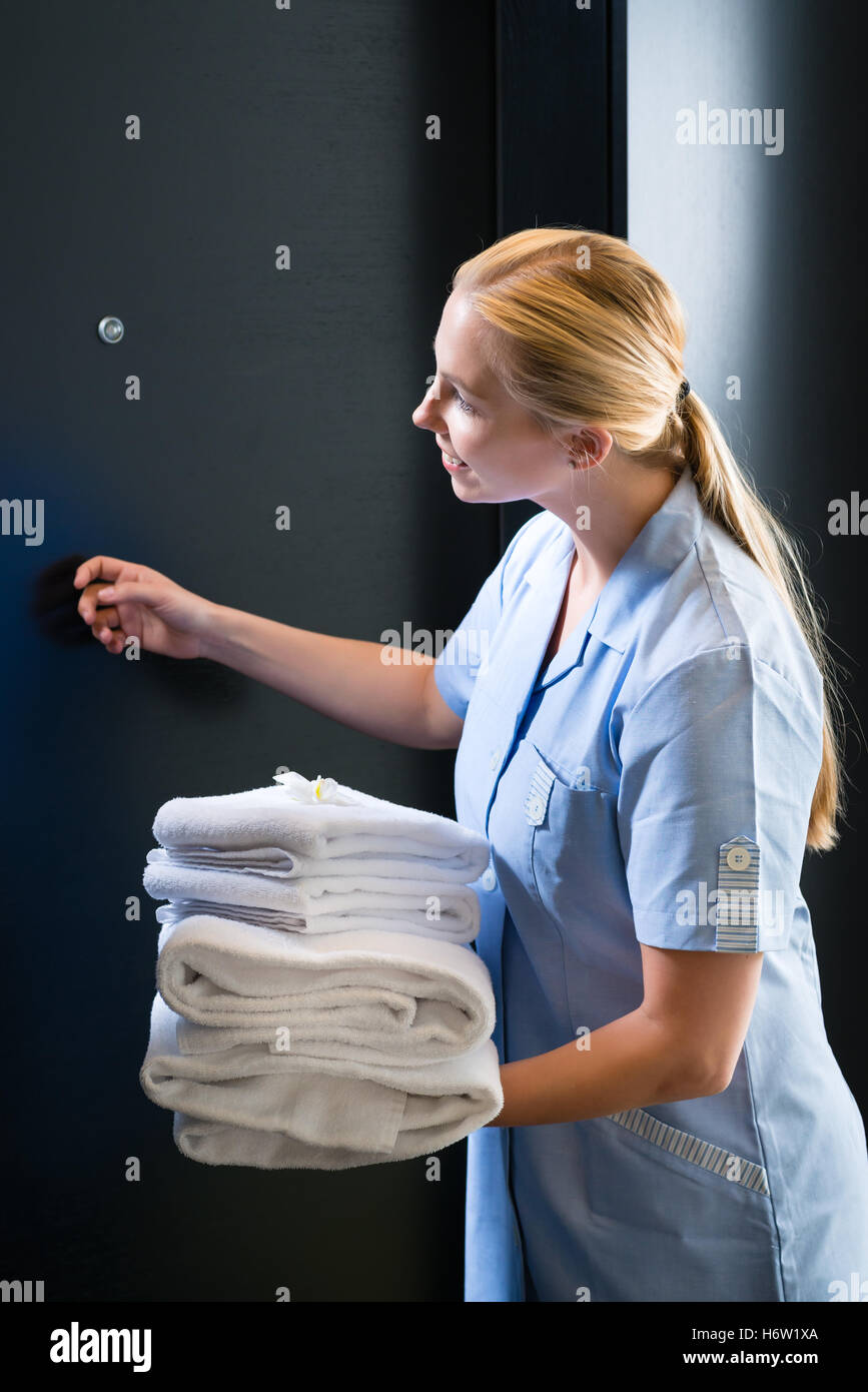 service door hotel hotel room charwoman room woman corridor staffer ...