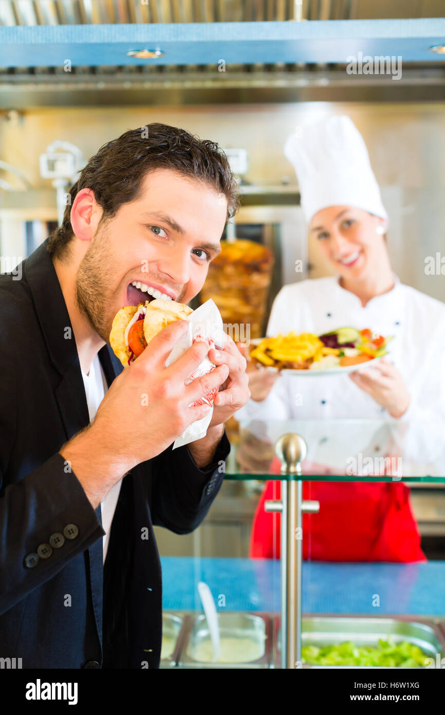 insalubrious fastfood snack snack stand meat woman humans human beings ...
