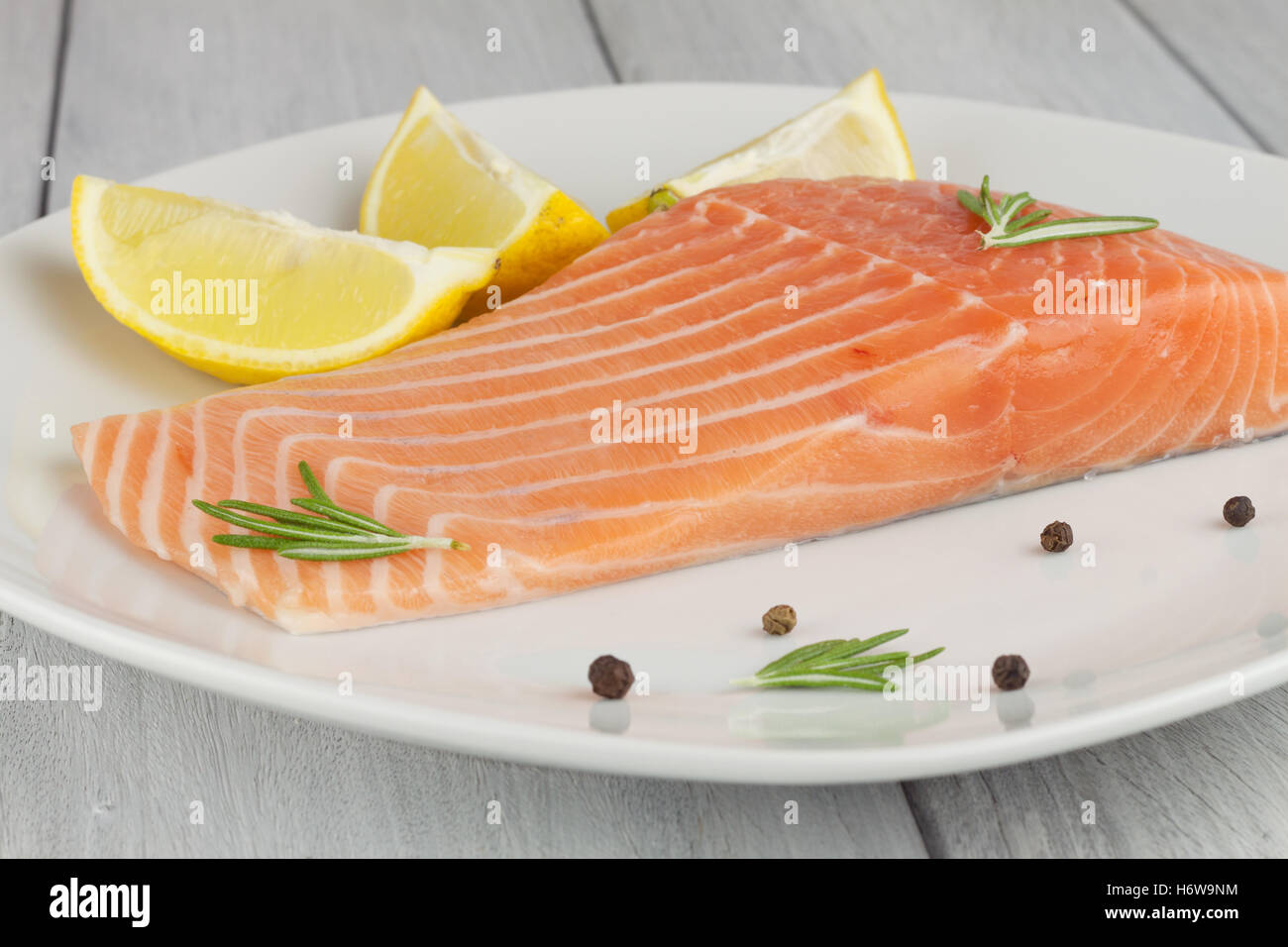 Sliced salmon fish fillet hi-res stock photography and images - Alamy