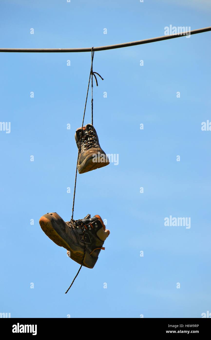 shoes on an overhead line in magdeburg Stock Photo - Alamy