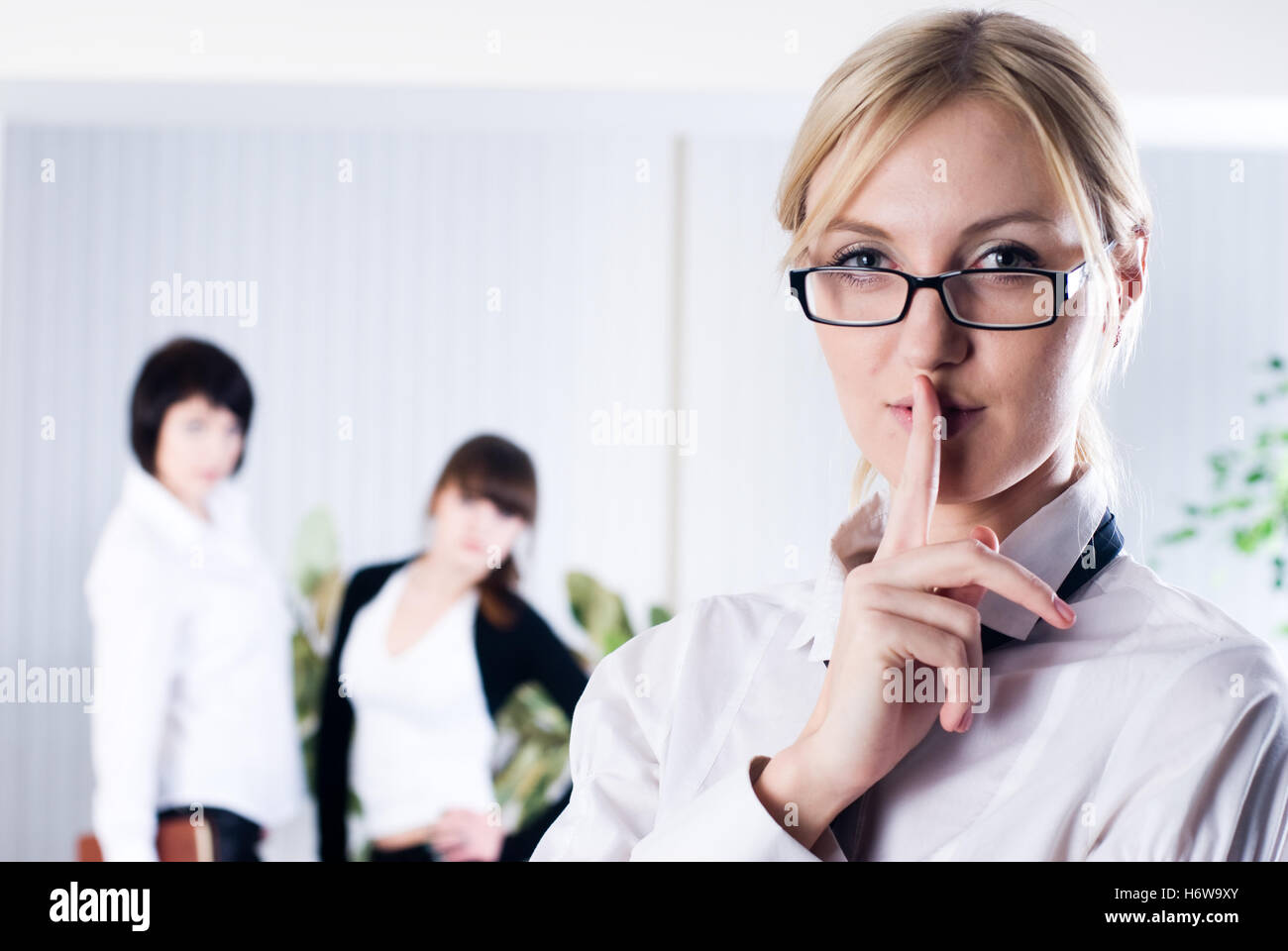 Office office workers whisper whisper hi-res stock photography and ...