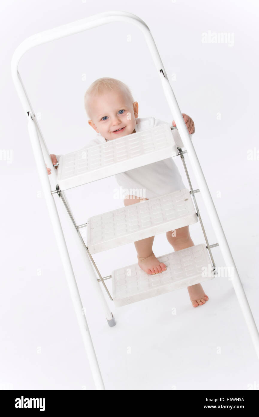 Toddler climb up ladder hi-res stock photography and images - Alamy
