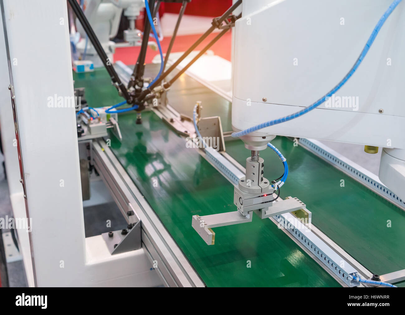 Robotic arm at production line in factory Stock Photo - Alamy