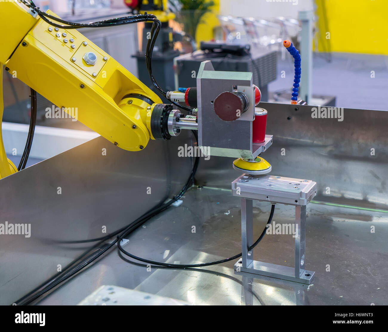 Automatic robotic arm for metal operations Stock Photo - Alamy