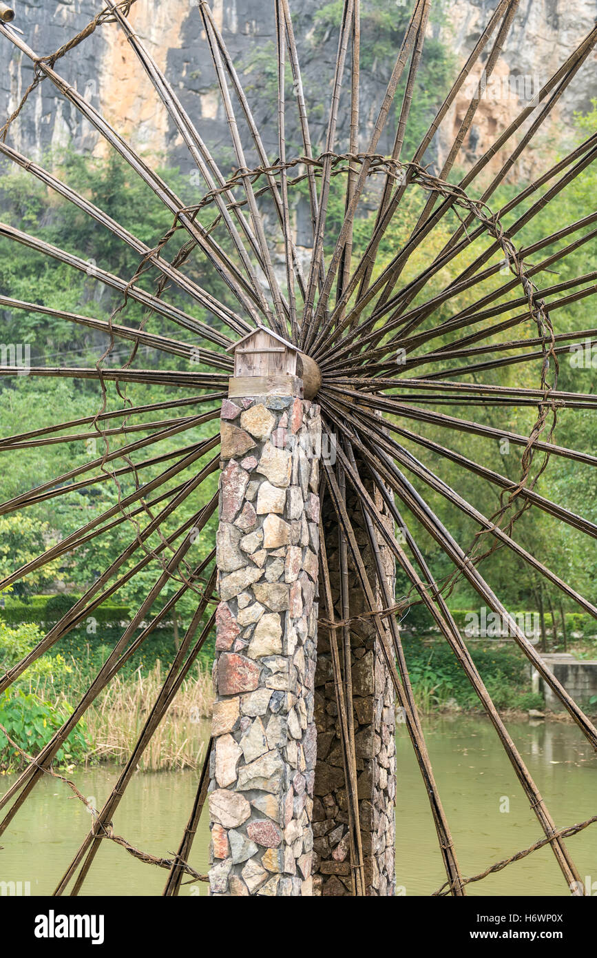 bamboo waterwheel is rotating Stock Photo - Alamy
