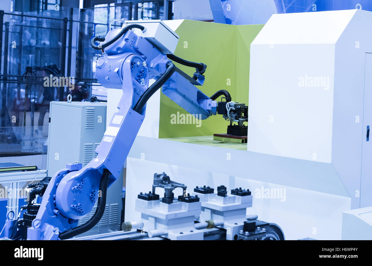Robotic arm at production line in factory Stock Photo - Alamy