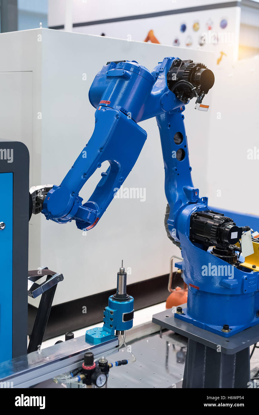 Robotic arm at production line in factory Stock Photo - Alamy