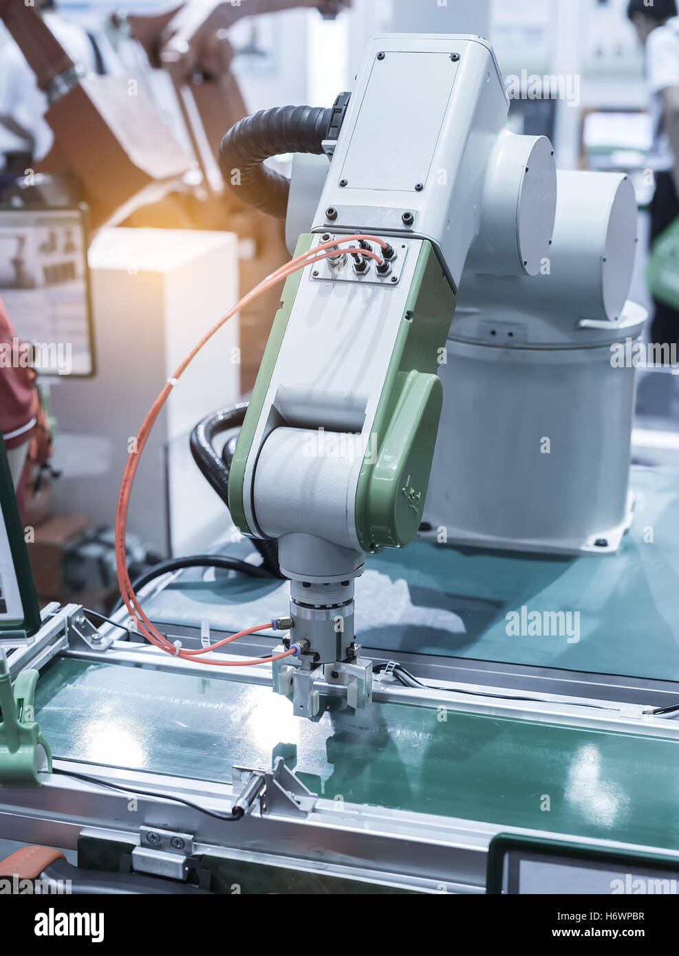 Robotic arm at production line in factory Stock Photo - Alamy