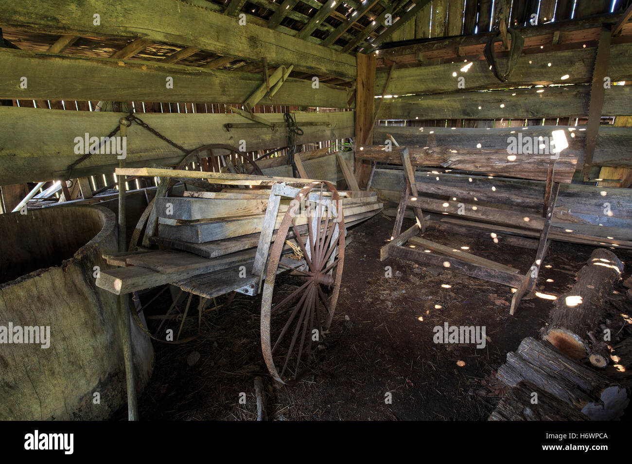 Old wagon stored in an old barn Stock Photo - Alamy