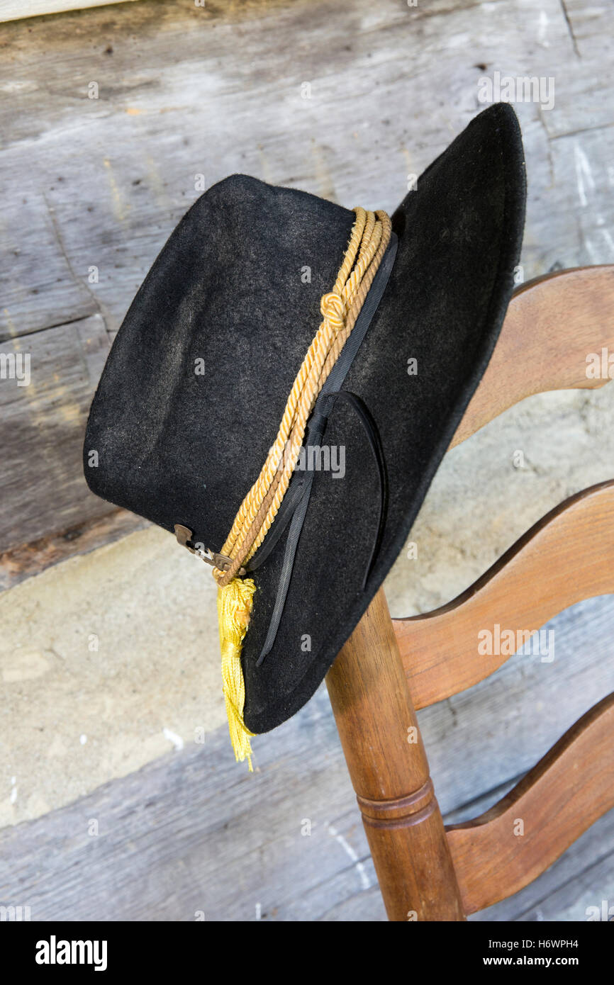 Old hat on chair Stock Photo - Alamy