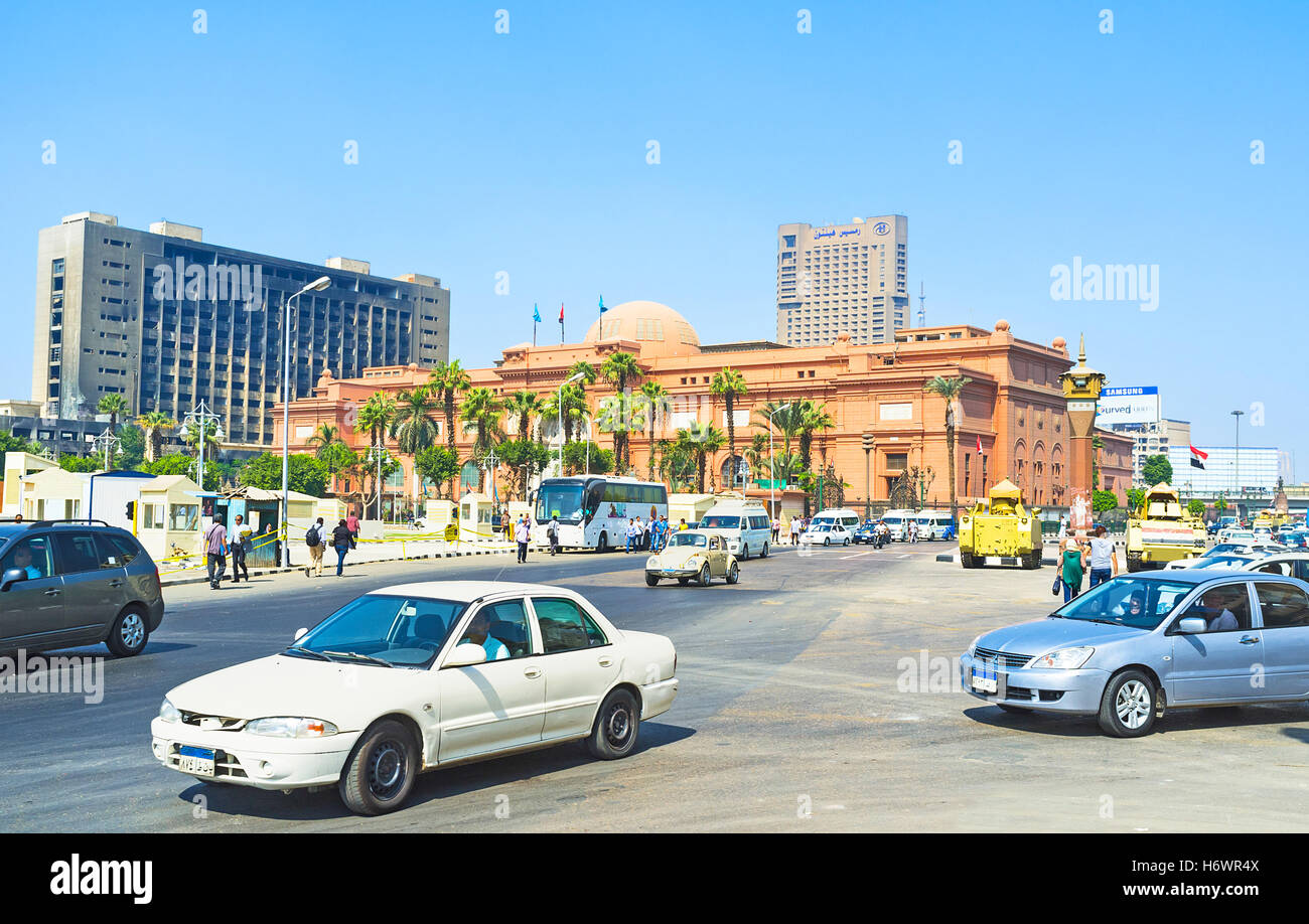 The Midan Tahrir with the chaotic traffic, army Republican Guard tanks ...
