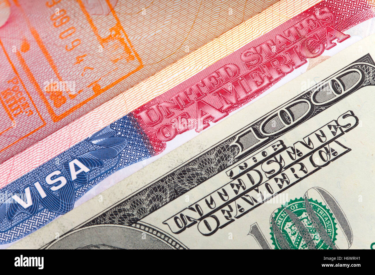 The American visa on page of the international passport and US dollars ...