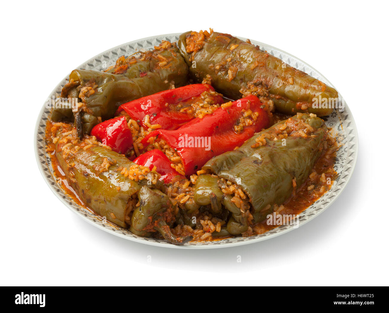 Traditional Moroccan dish with stuffed bell peppers and rice on white ...