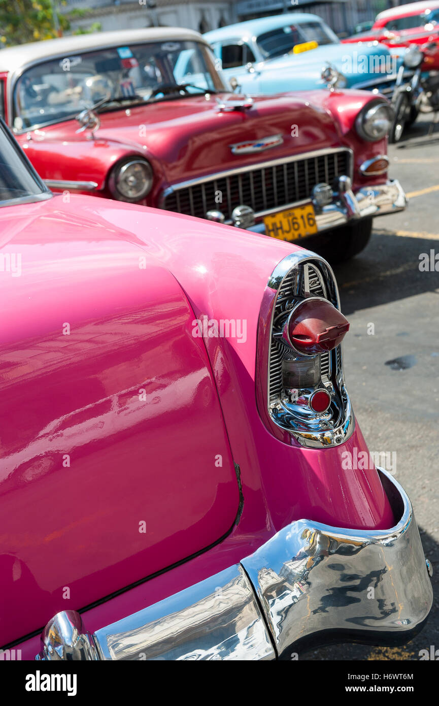 HAVANA - JUNE 13, 2011: Colorful vintage American cars stand parked in ...