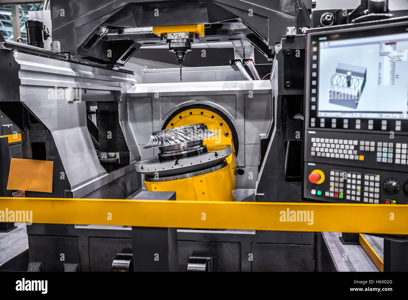 Metalworking CNC milling machine. Cutting metal modern processing ...