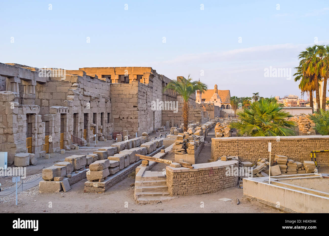 Tha archaeological site of the Luxor Temple in the last rays of sun ...