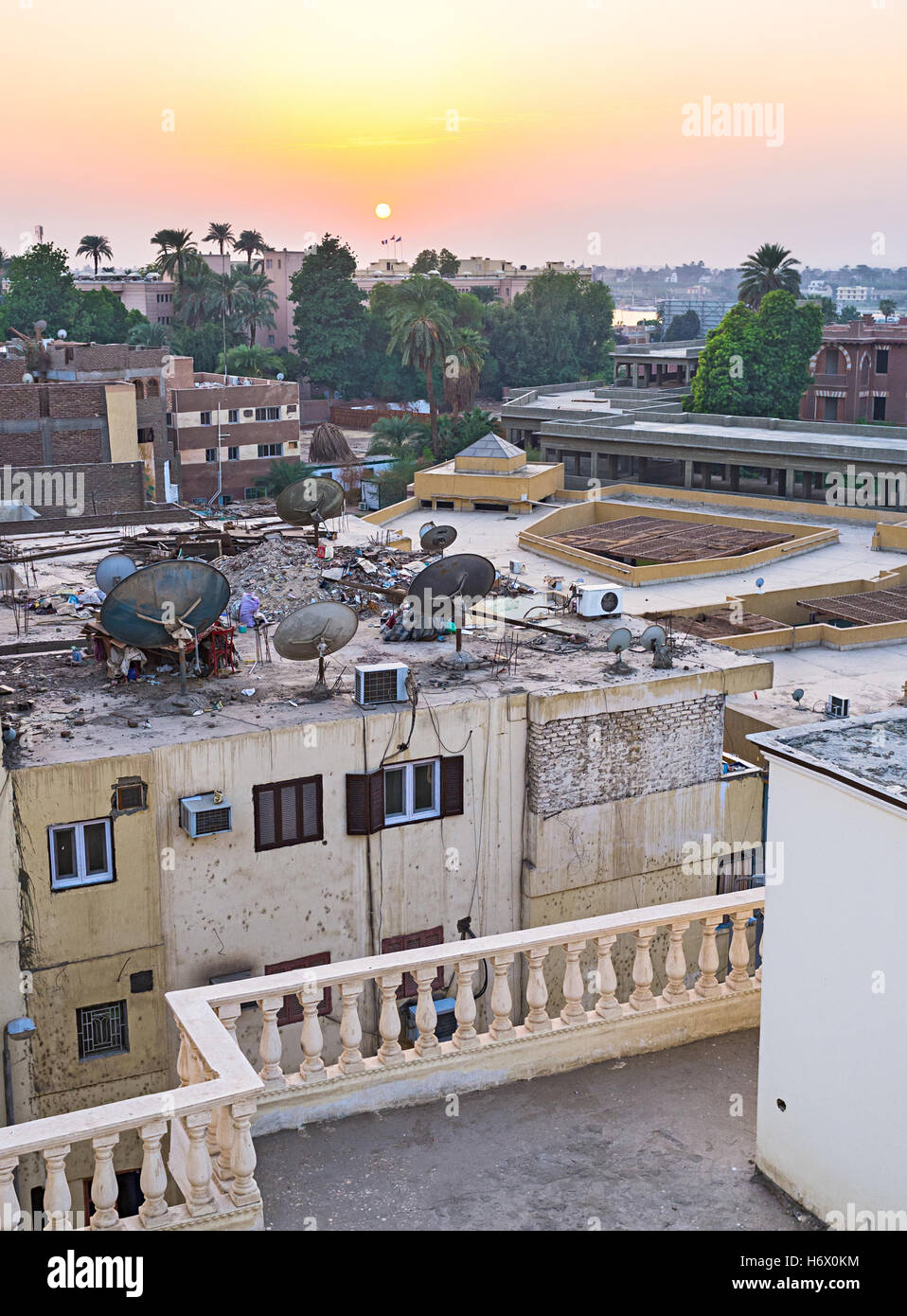 The colorful sunset over the slums of Luxor, Egypt Stock Photo - Alamy