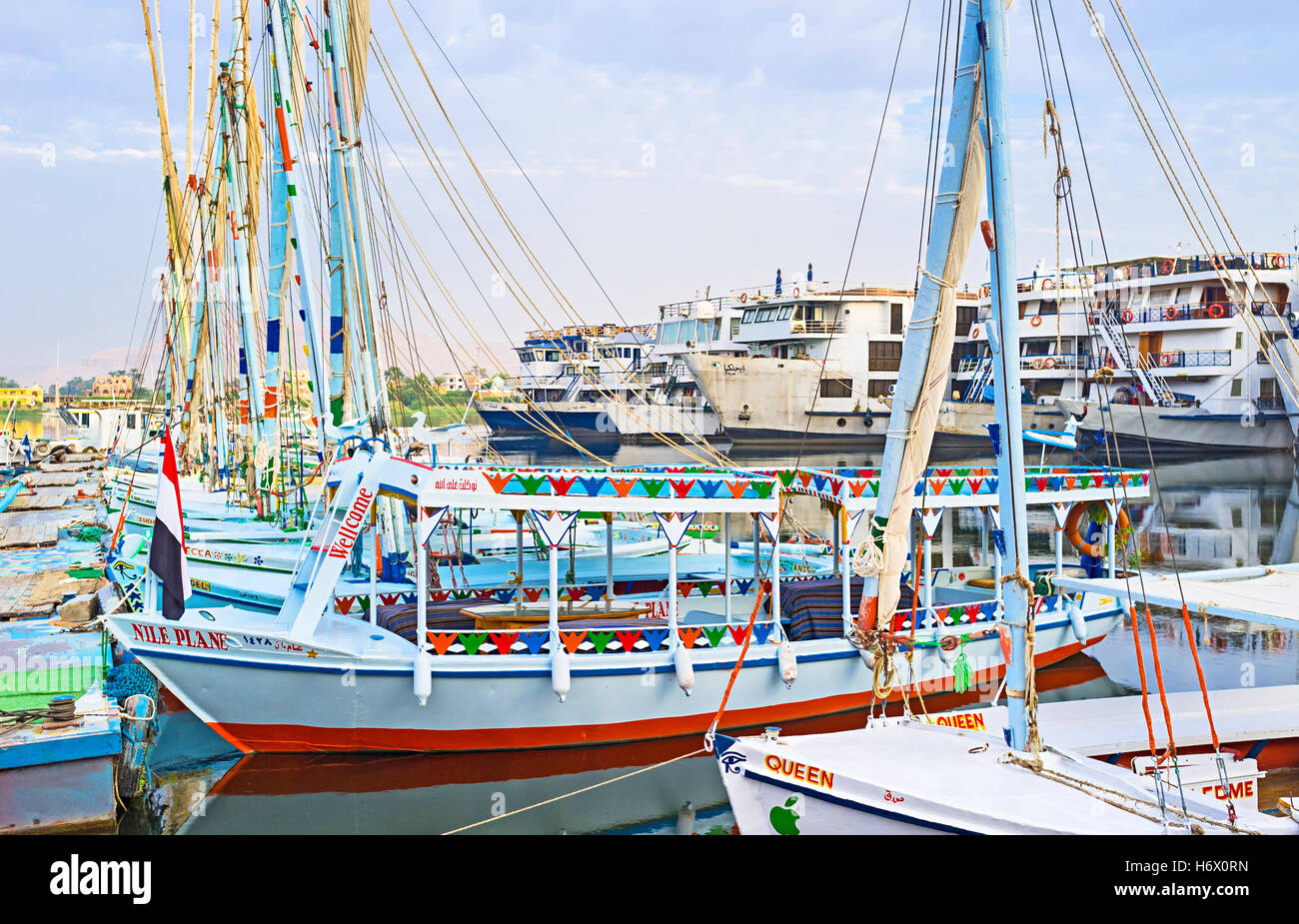 The port of Luxor is full of the old feluccas and colorful motor boats ...