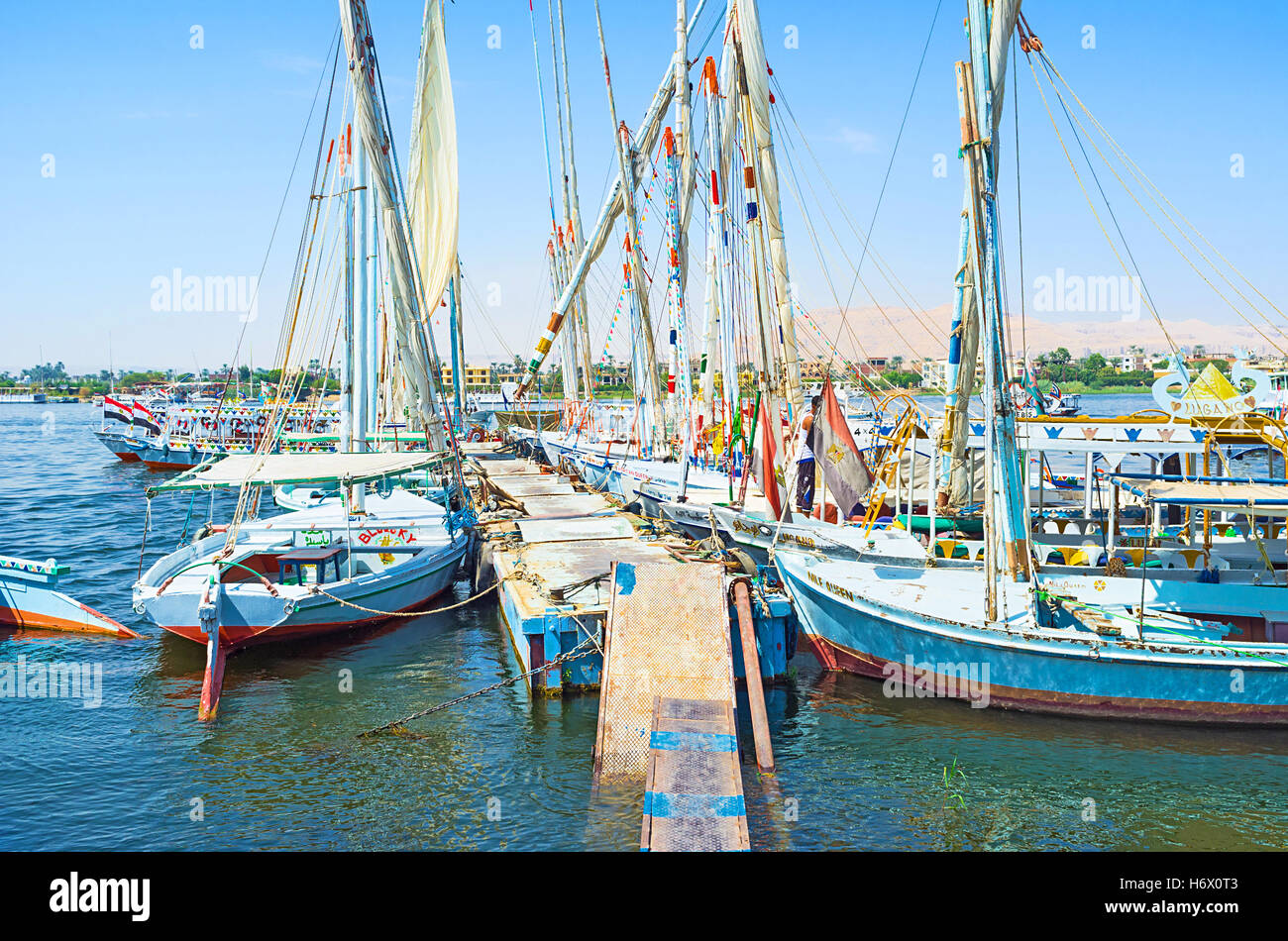 The old colorful feluccas wait for the evening trips at the shipyard ...