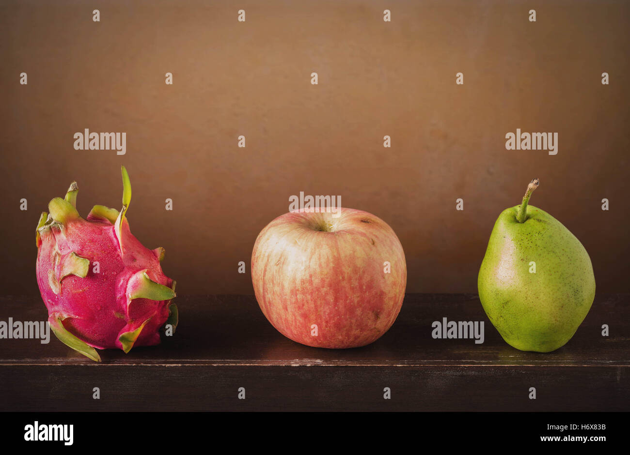 Three of fruits for prepared on the old wooden Stock Photo - Alamy