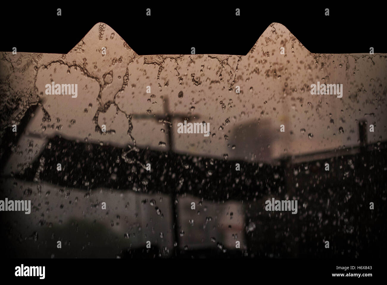 Rain fell on the awning walls with shadows Stock Photo - Alamy
