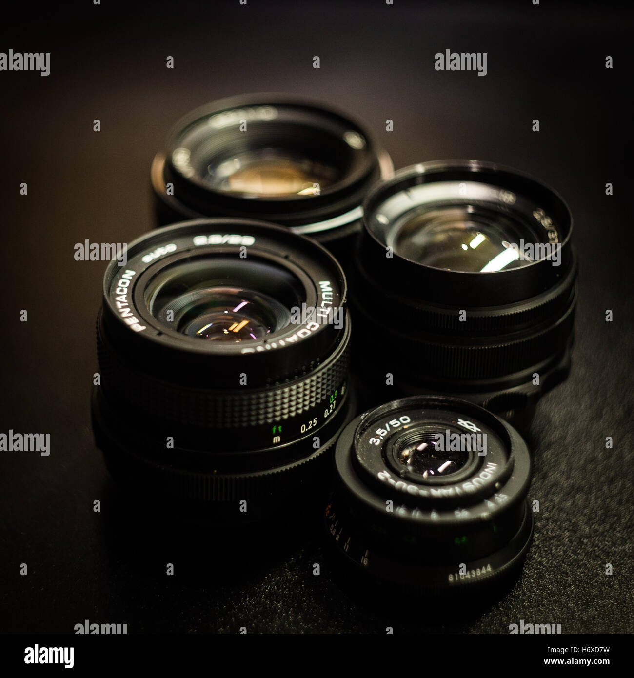 Retro photo camera lens on dark background Stock Photo - Alamy