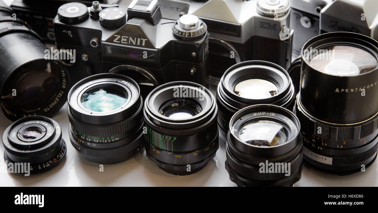 Bunch of retro cameras and lens Stock Photo - Alamy
