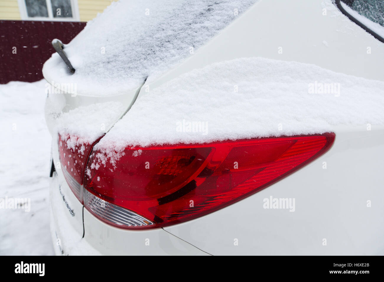 car covered with snow during a winter storm Stock Photo - Alamy
