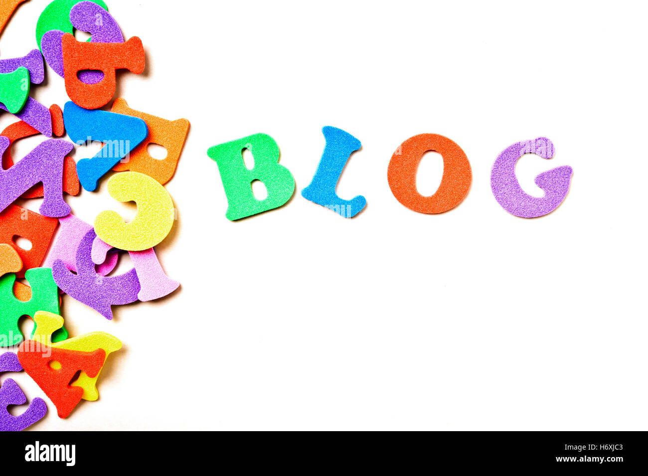 colorful letters scattered around forming the word blog Stock Photo - Alamy