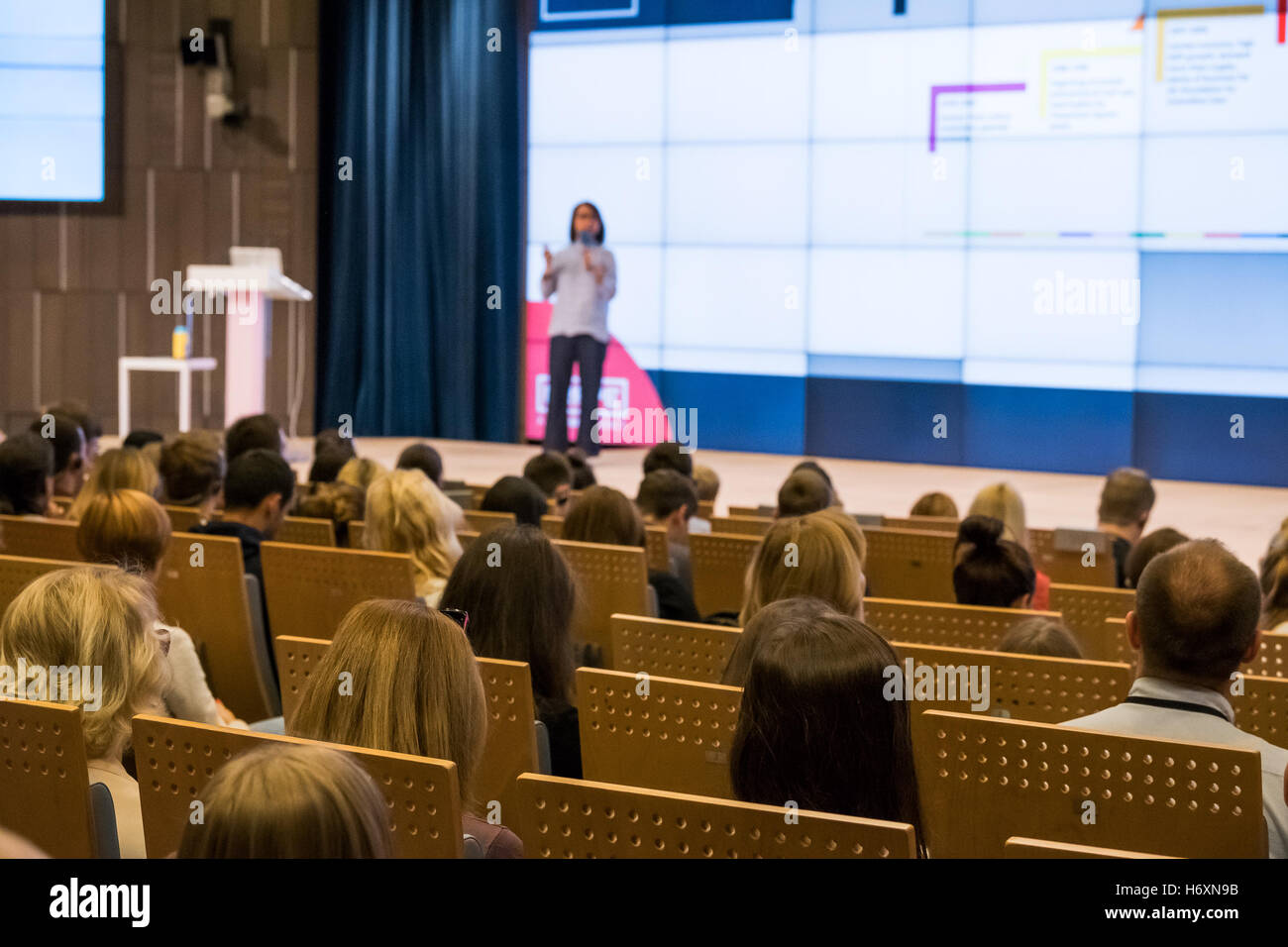 Audience listening a lecture Stock Photo - Alamy