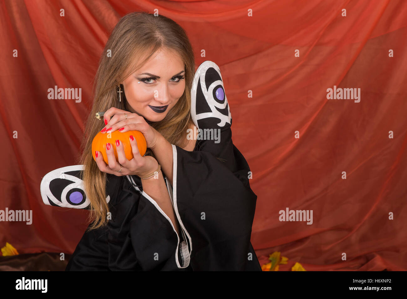 Beauty sensual woman in black dress , halloween Stock Photo - Alamy