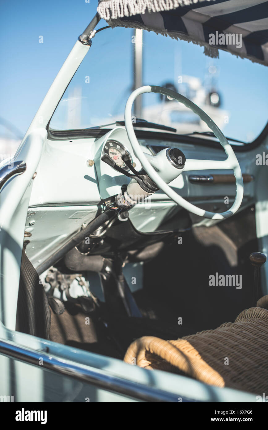 Vintage small blue car on sunlight Stock Photo - Alamy