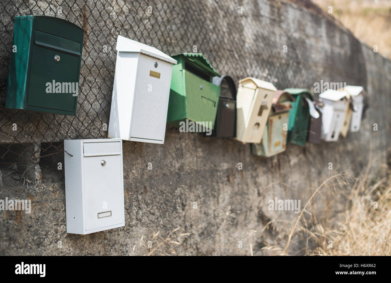 Various mailboxes. Different colors and shapes Stock Photo - Alamy