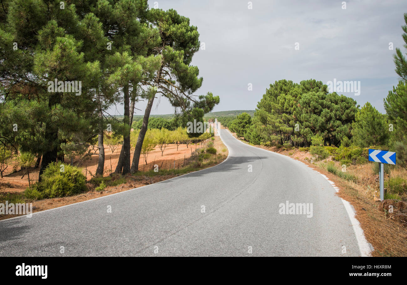 Road in the mountain. Dramatic scene Stock Photo - Alamy