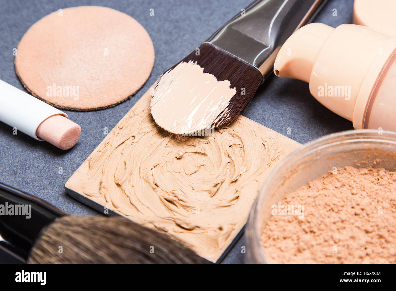 Set of makeup products and accessories to even out skin tone and ...