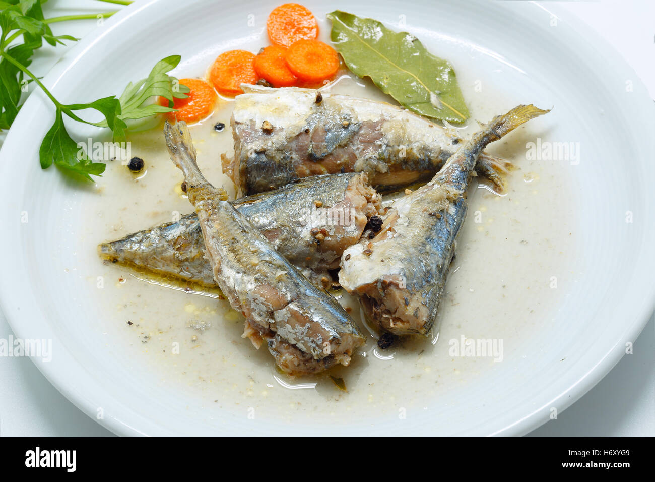 Close up of Marinated mackerel with olive oil Stock Photo - Alamy