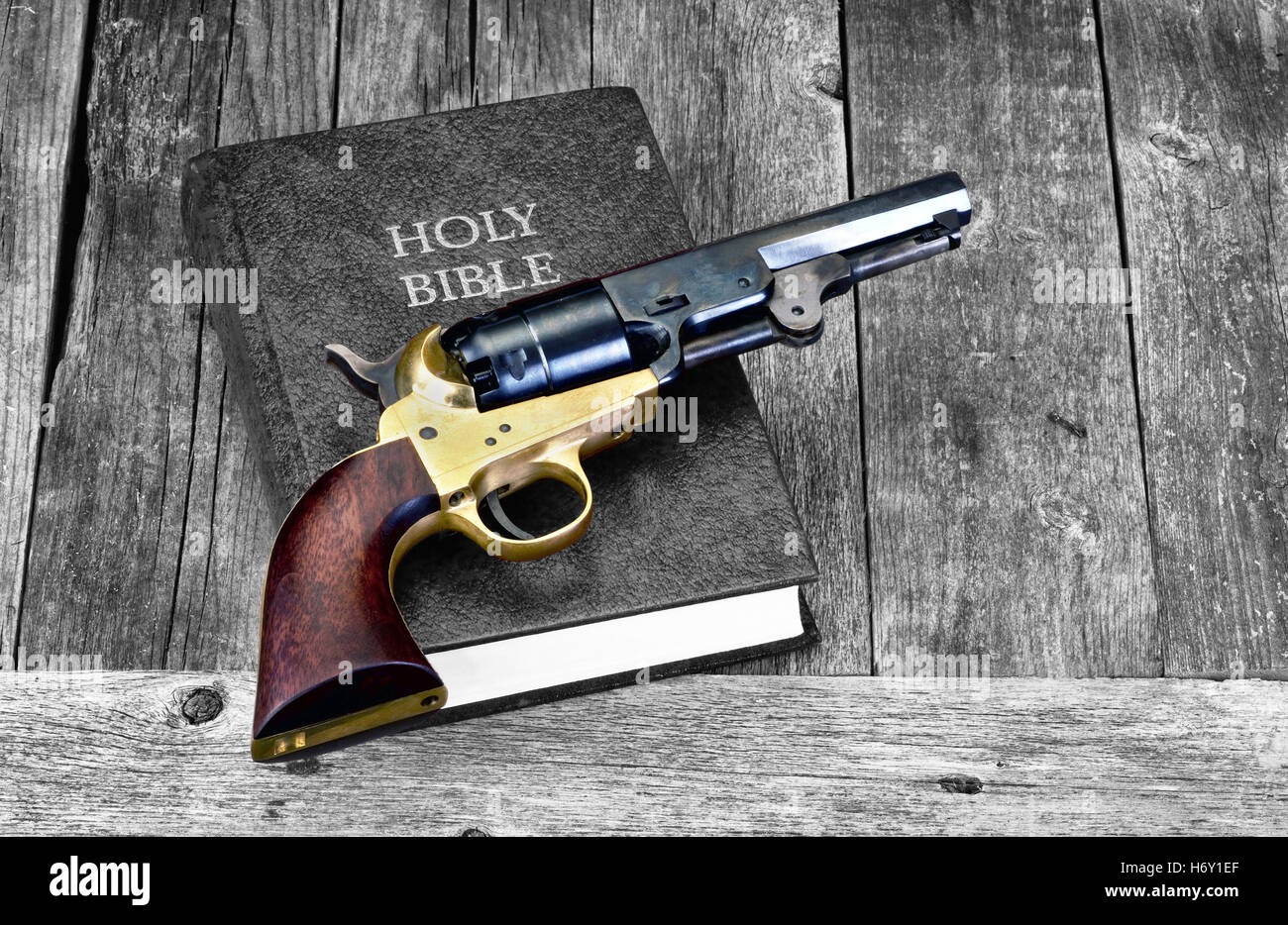 Old Western pistol on Holy Bible with room for your type Stock Photo ...