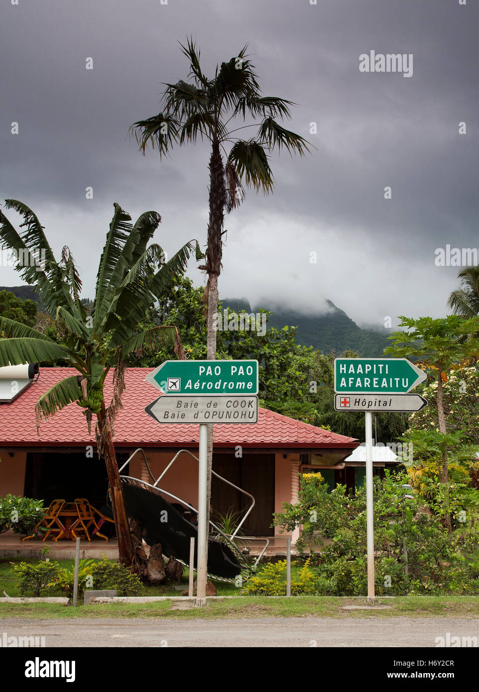 Road signs after a rain shower on the island of Moorea, French ...