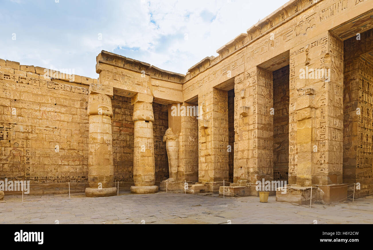 The peristyle court of Habu Temple with different types of columns and ...