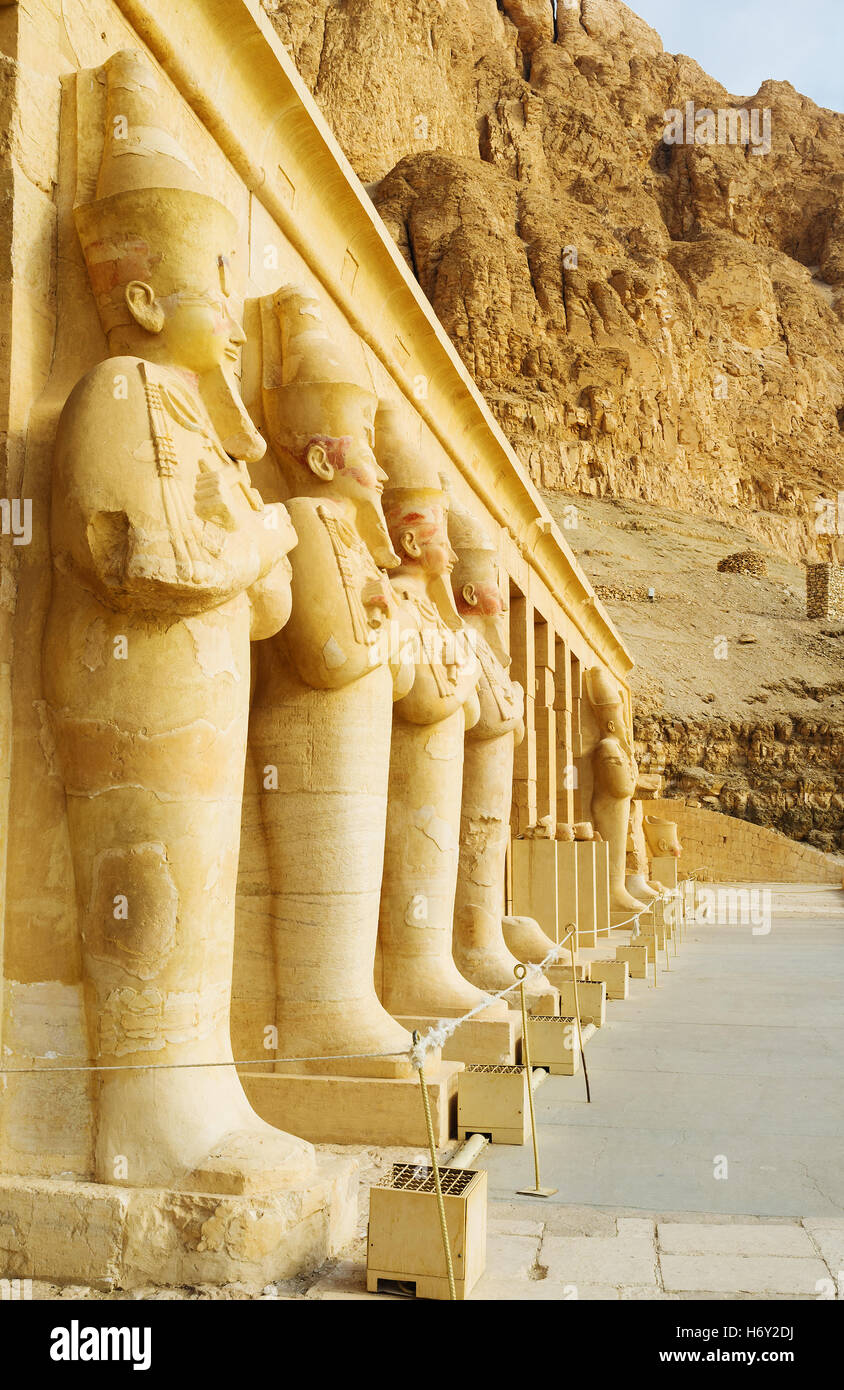 The Osirian statues of Hatshepsut stands next to each pillar at her ...
