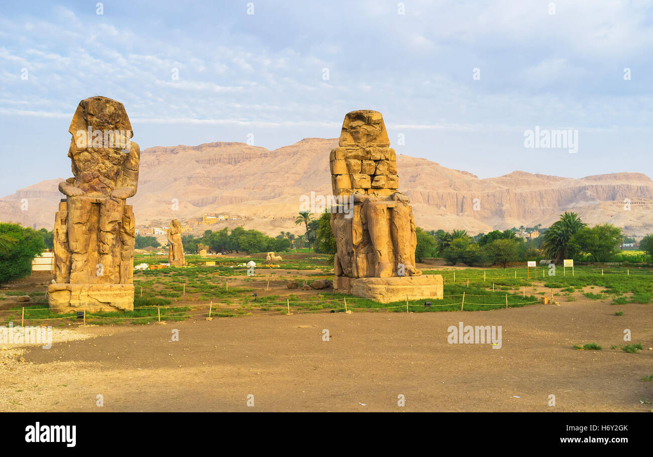 The Colossi of Memnon are the massive statues of the Egyptian Pharaoh ...
