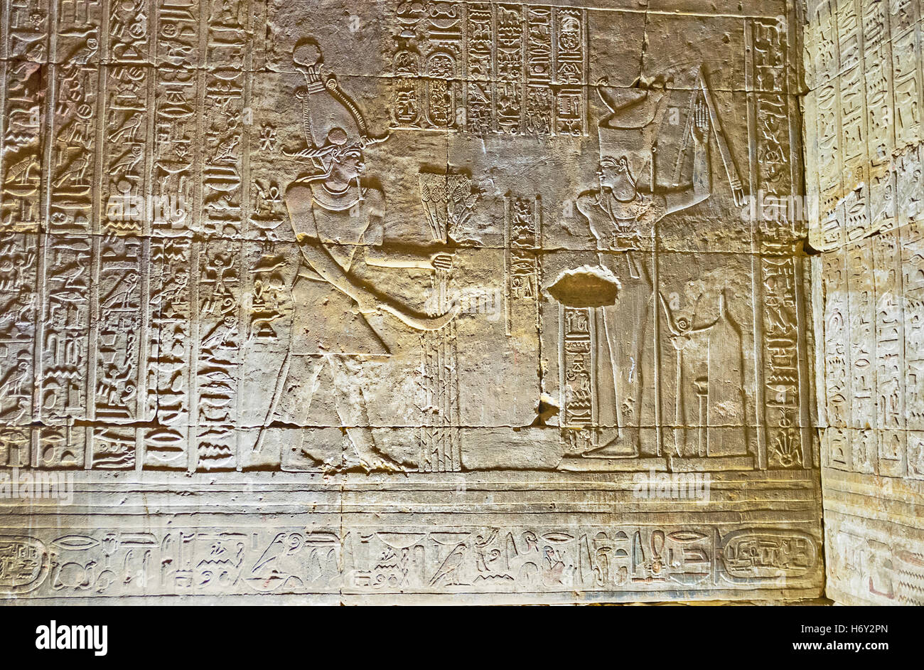 The walls of the Horus Temple decorated with the scenes of the Edfu ...