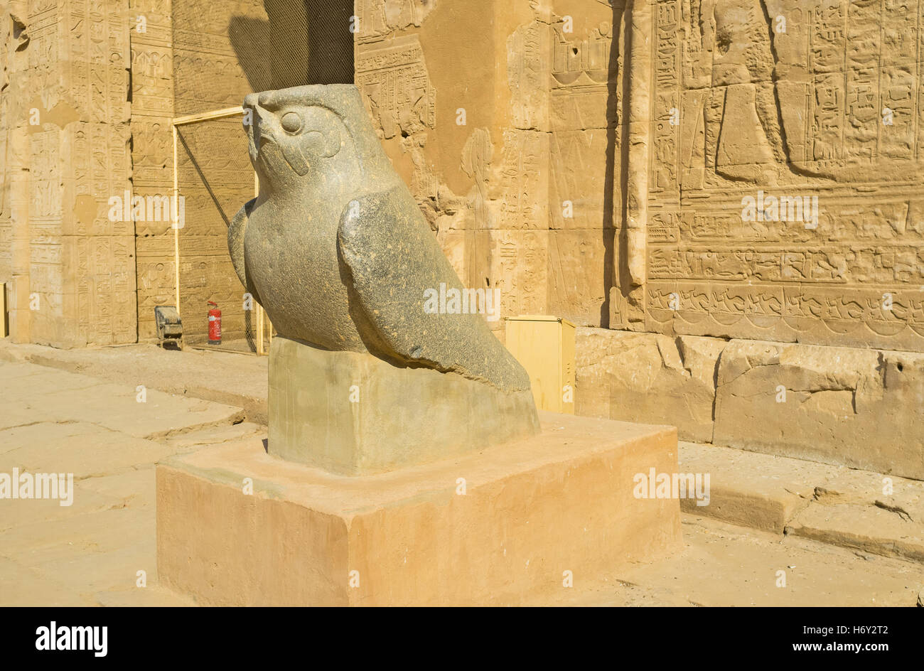 The old stone falcon is the symbol of the Horus Temple in Edfu, Egypt ...
