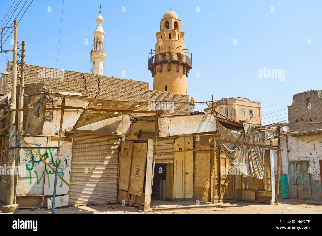 The high minarets behind the abandoned stalls on the market street ...