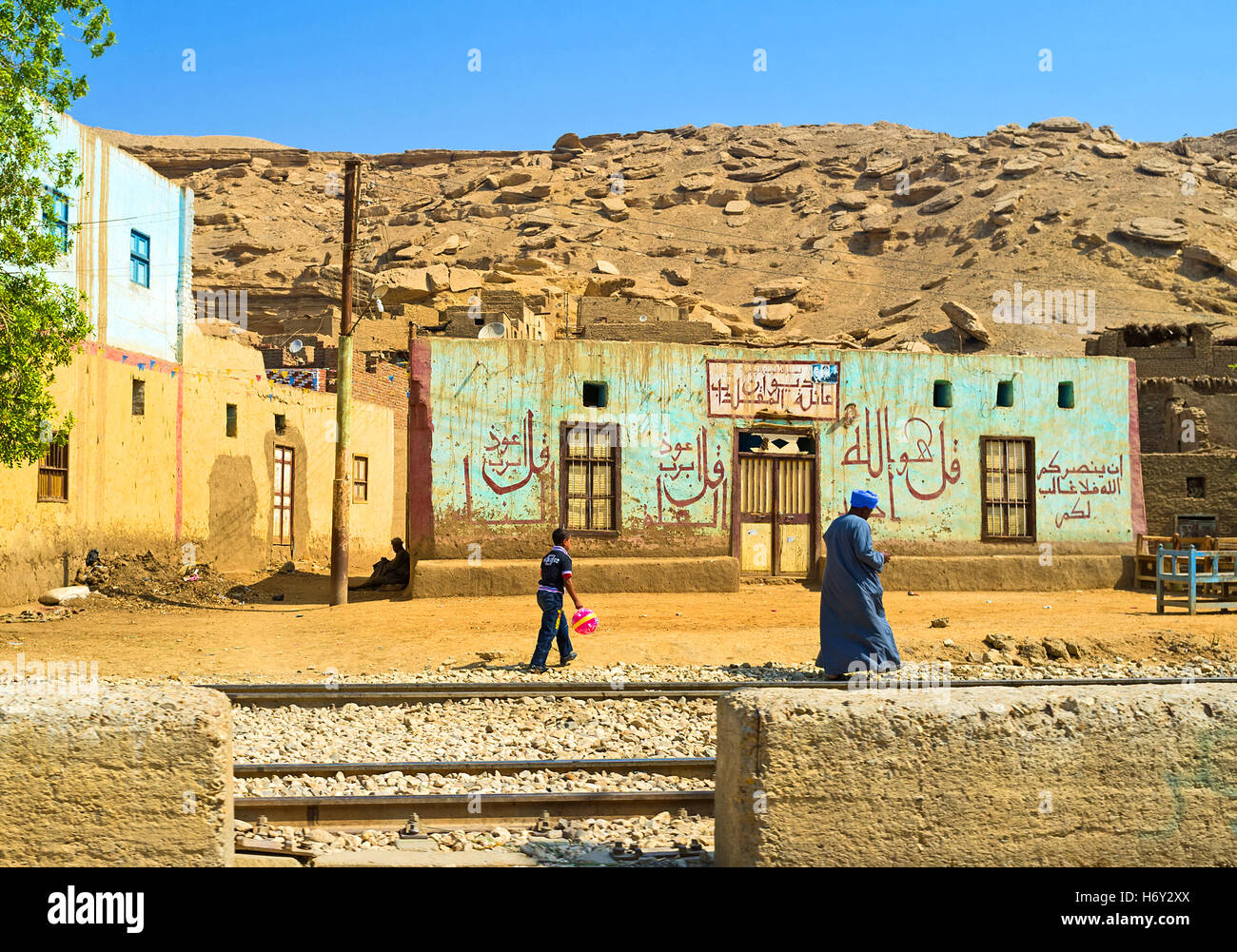 : The old village building decorated with the inscriptions of Quran ...