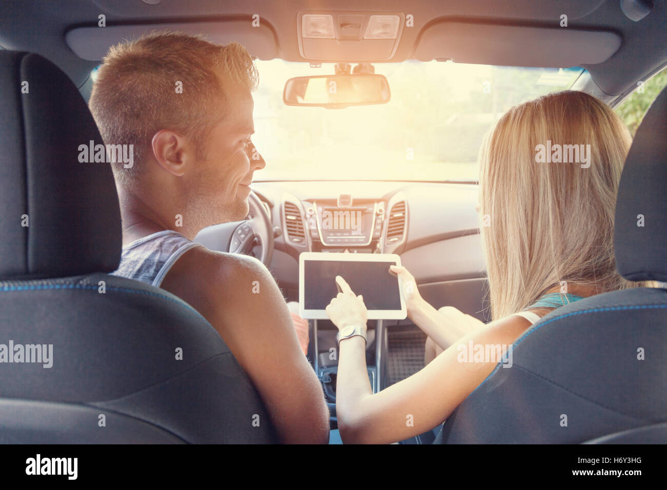 Young happy people enjoying a roadtrip in the car Stock Photo - Alamy