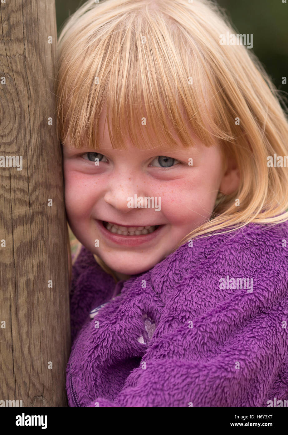 Young 4 year old girl playing and posing at a playground Stock Photo ...